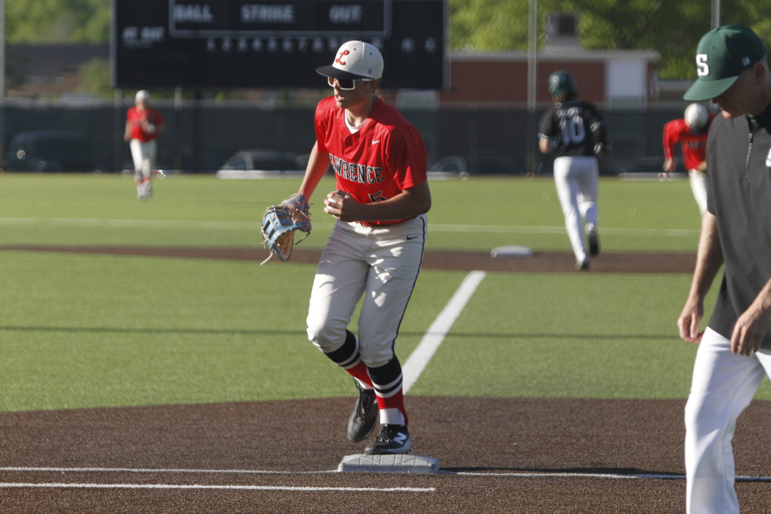 Lawrence baseball falls 6-3 to Shawnee Mission South with errors ...